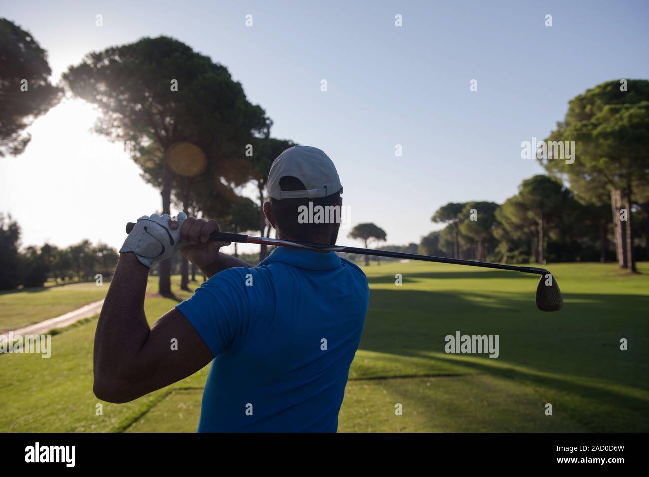 golf player hitting shot Stock Photo - Alamy