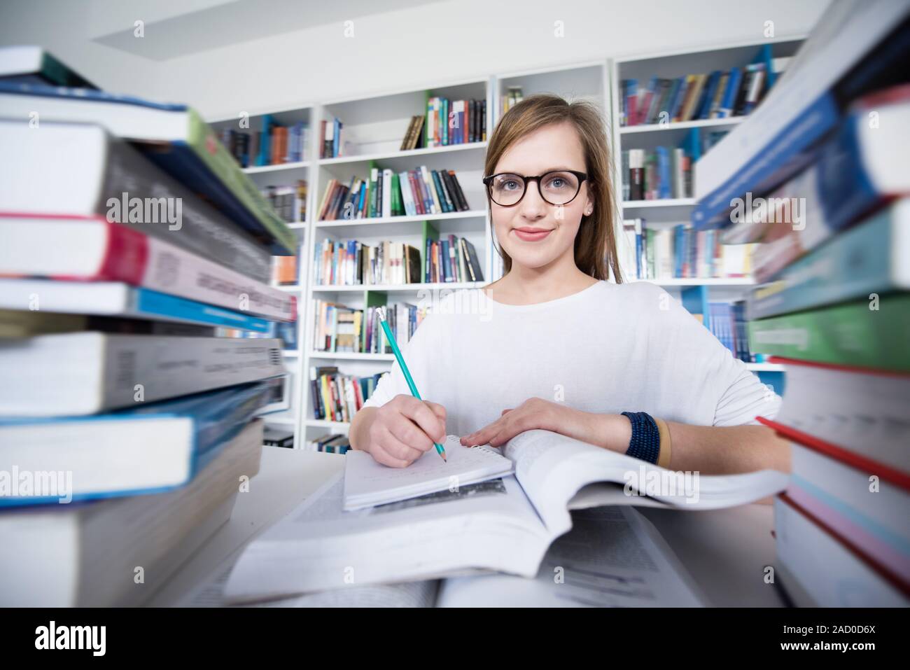 student study in library Stock Photo - Alamy