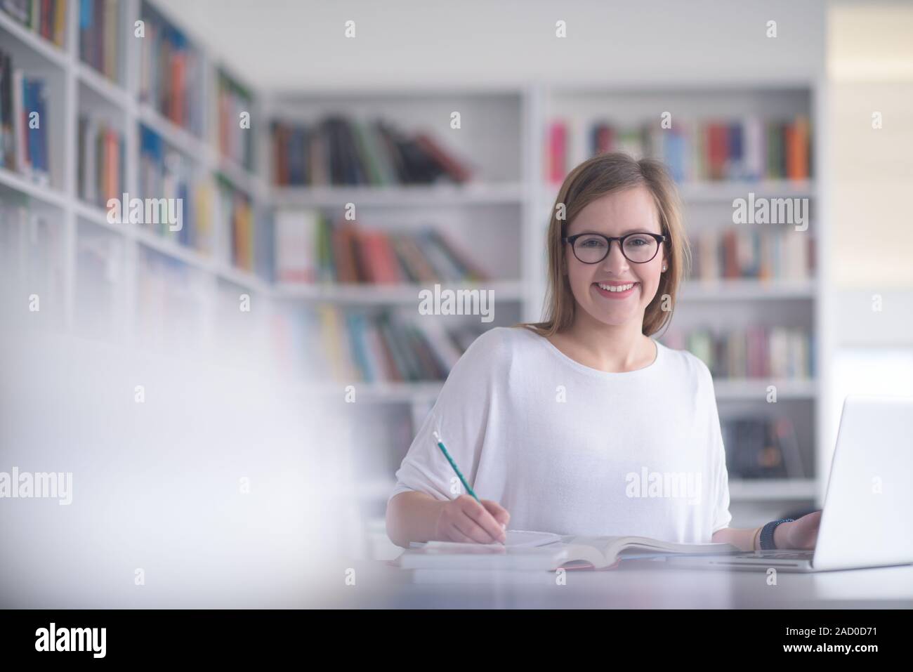 student study in library Stock Photo - Alamy