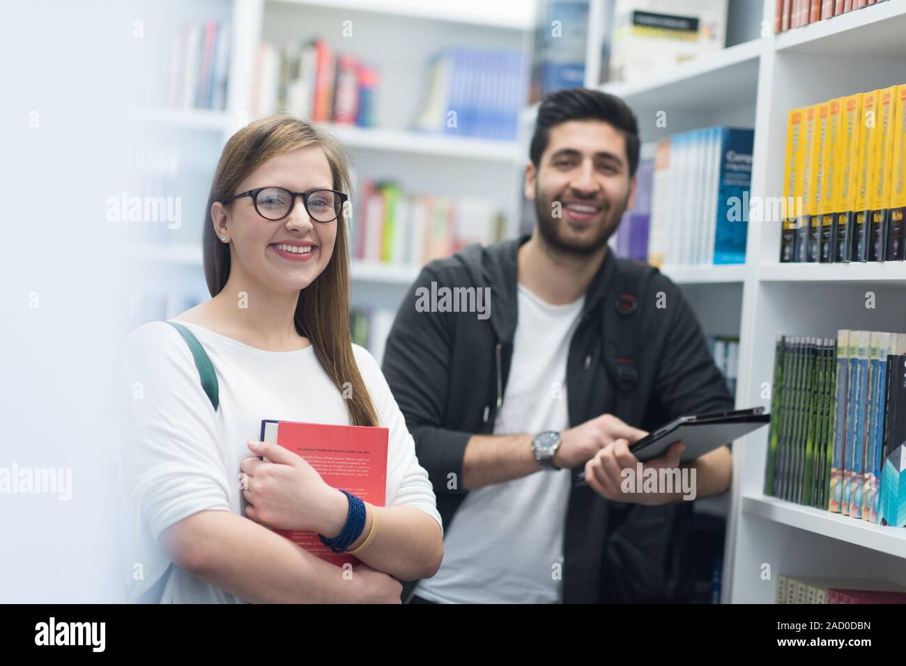 students group in school library Stock Photo - Alamy