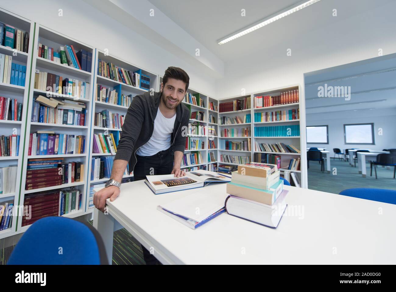 student study in school library Stock Photo - Alamy