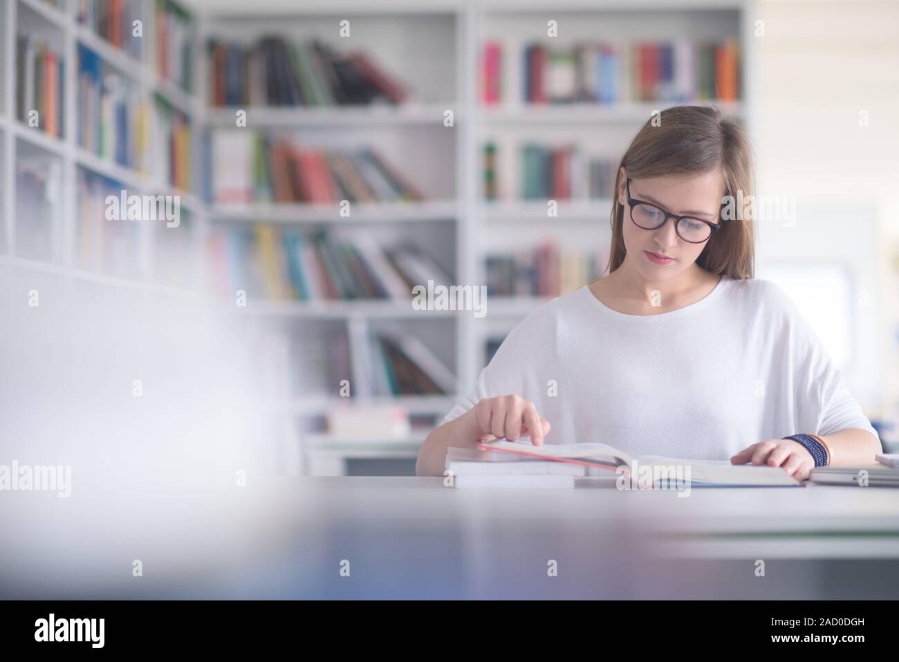 student study in library Stock Photo - Alamy