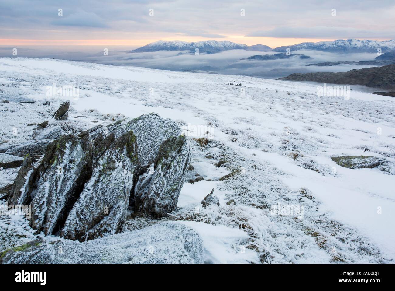 Red Screes above Ambleside with mist from a temperature inversion, Lake ...