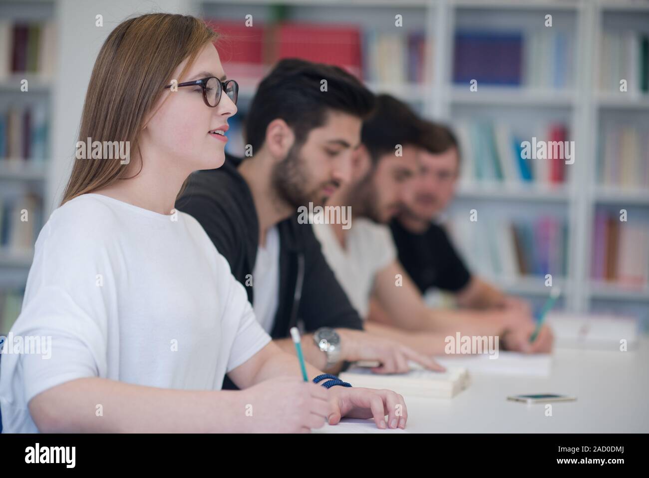 group of students study together in classroom Stock Photo - Alamy