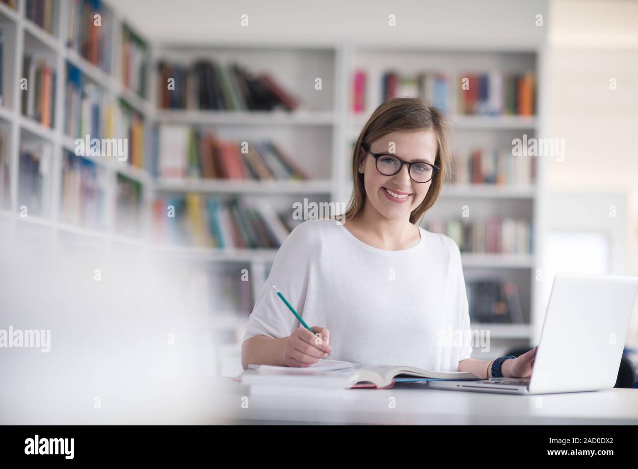 student study in library Stock Photo - Alamy