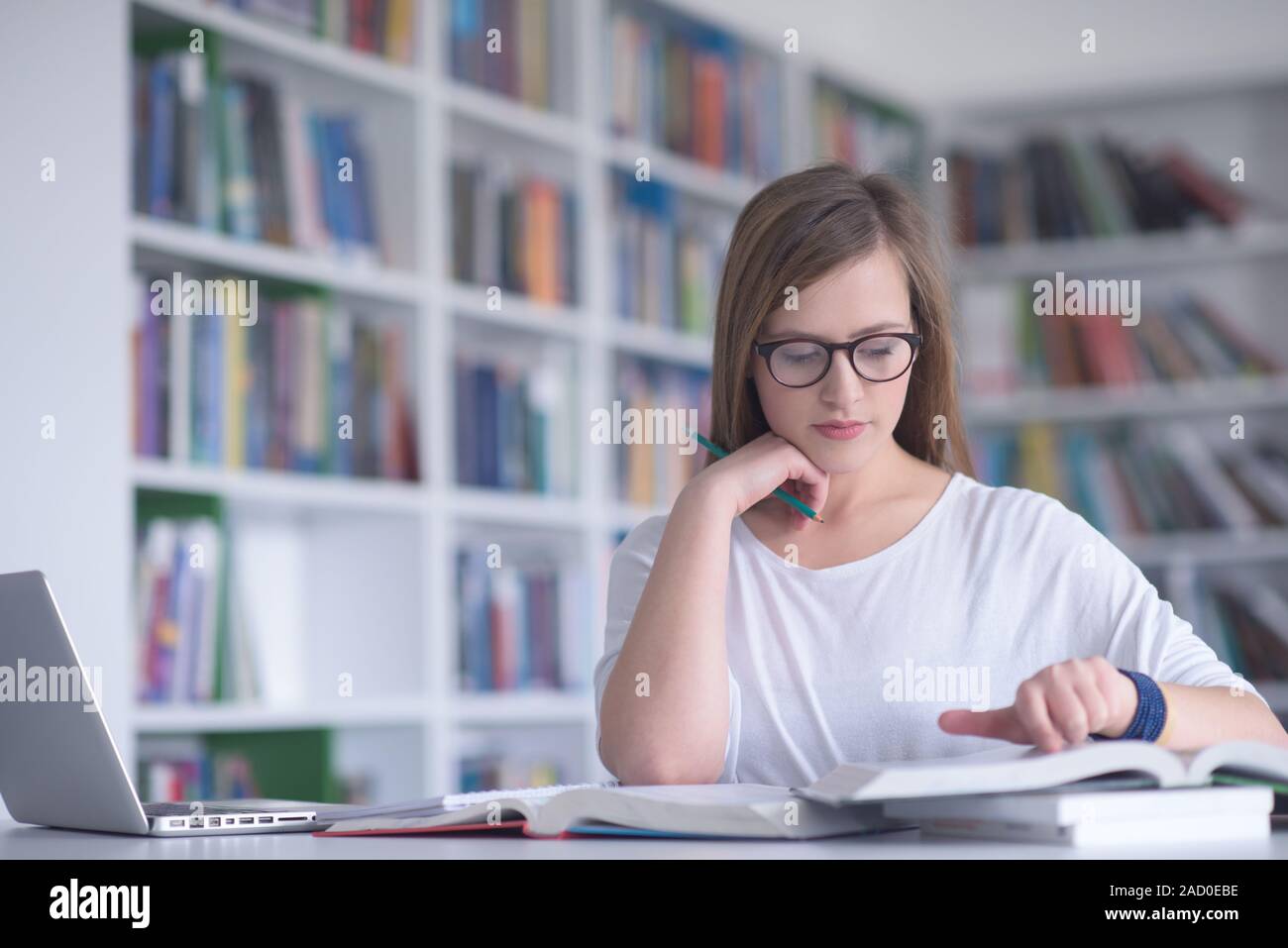 student study in library Stock Photo - Alamy