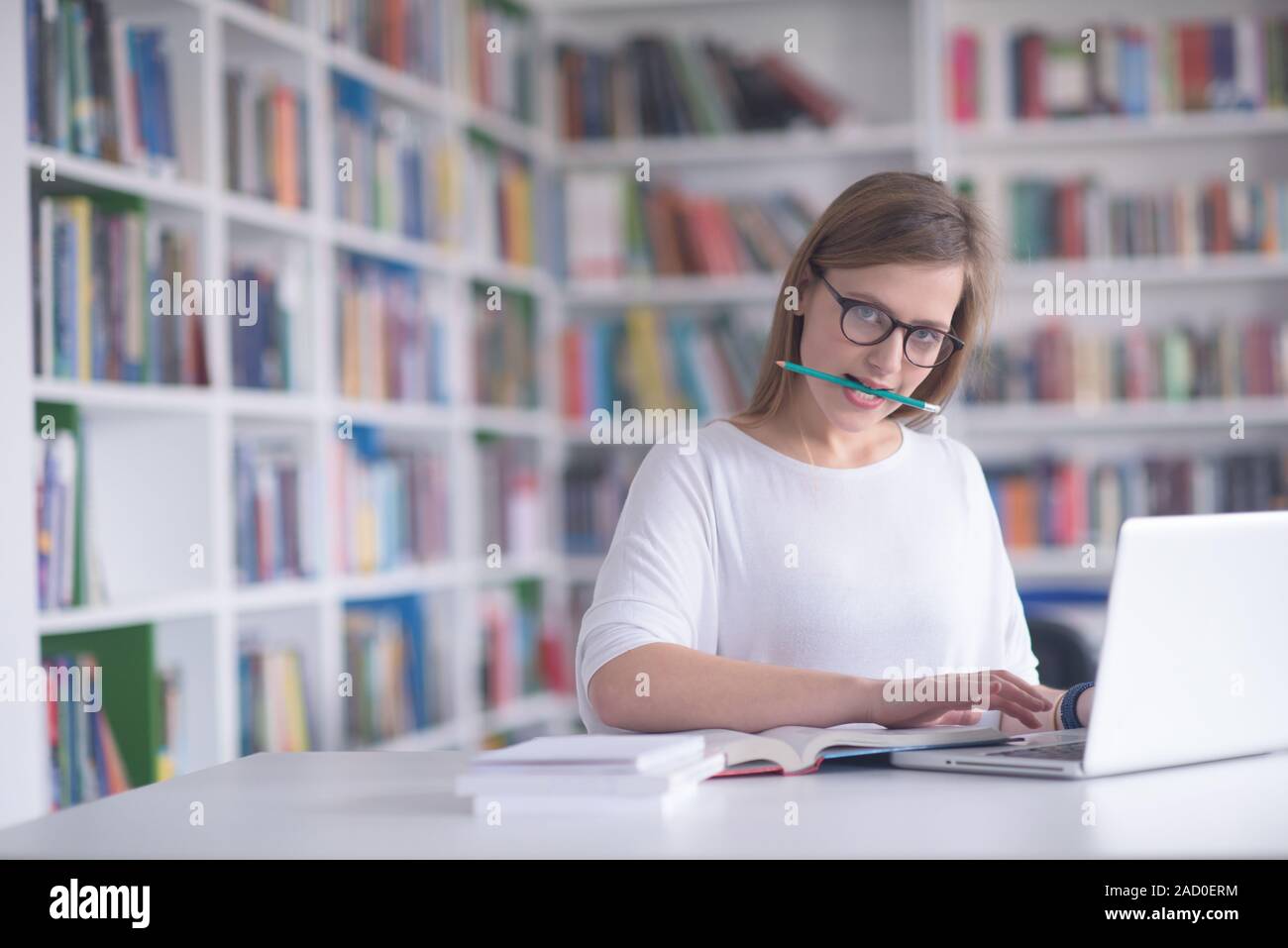 student study in library Stock Photo - Alamy