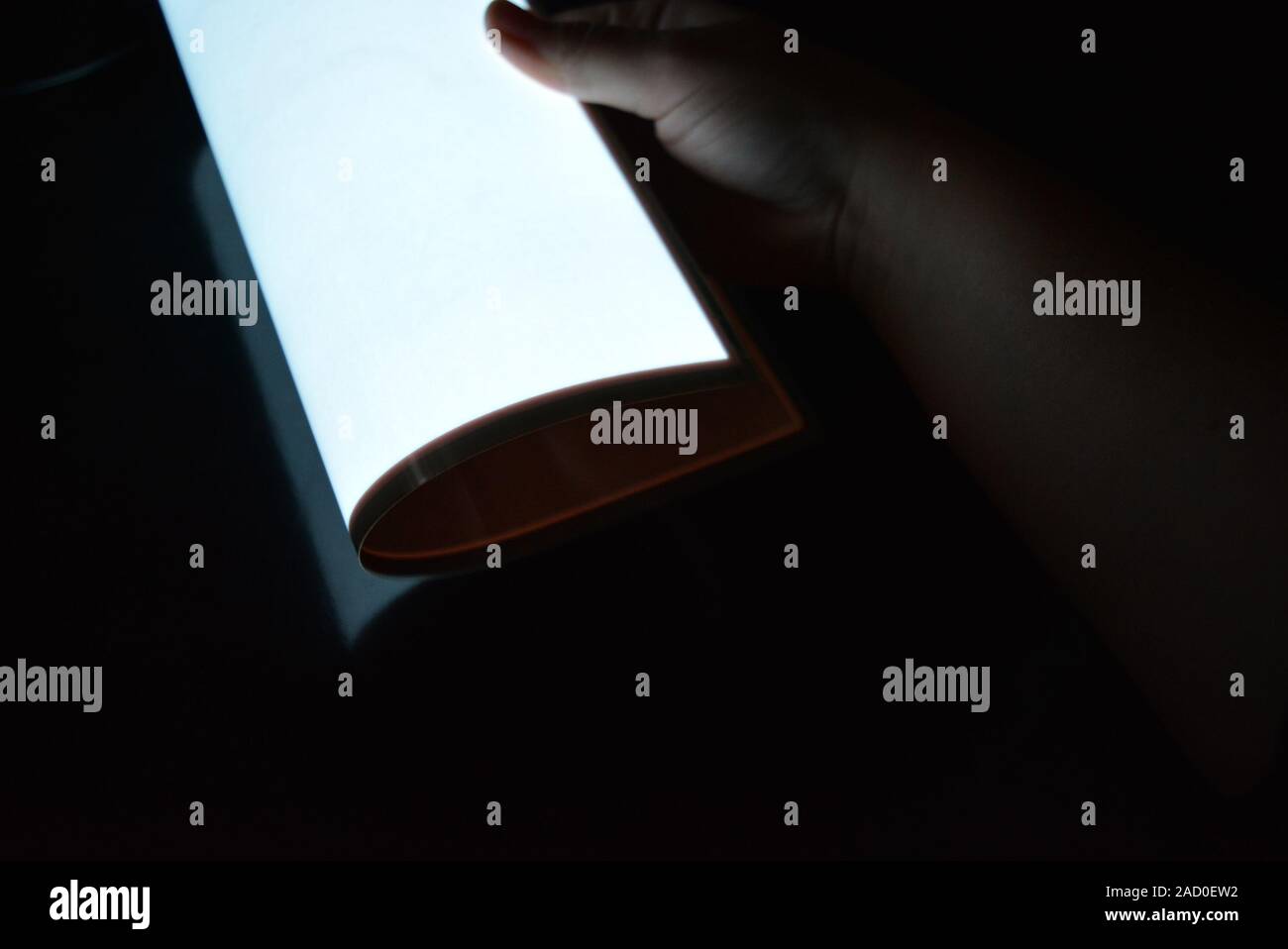 Very bright and luminous A4 electroluminescent paper with an coating is ...