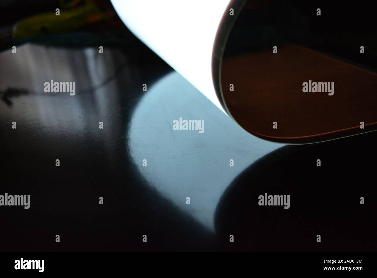 Luminous A4 paper with an electroluminescent coating is located in ...