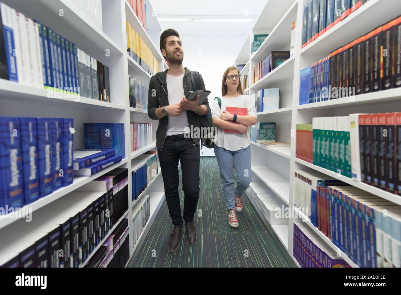 students group in school library Stock Photo - Alamy