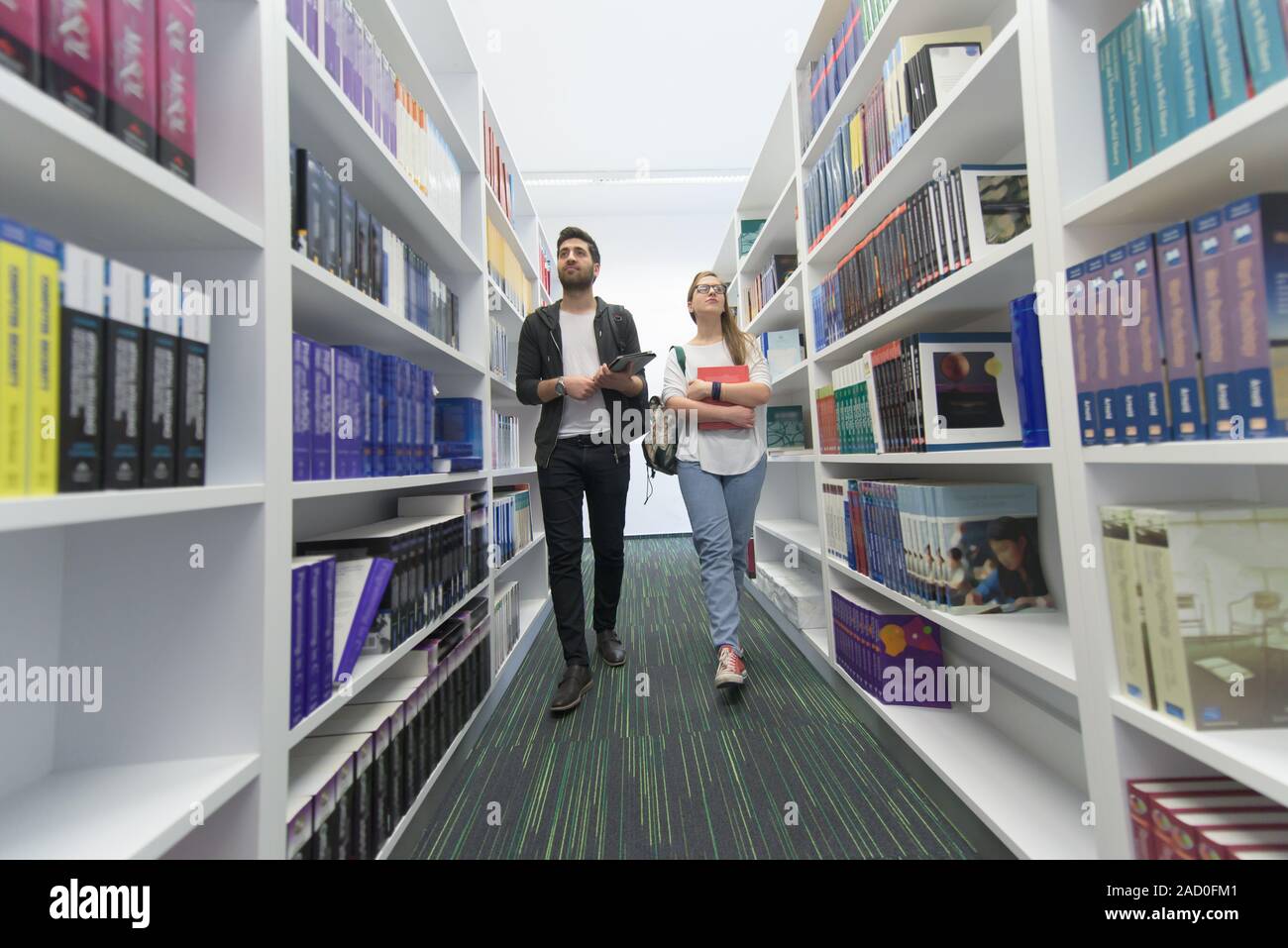 students group in school library Stock Photo - Alamy
