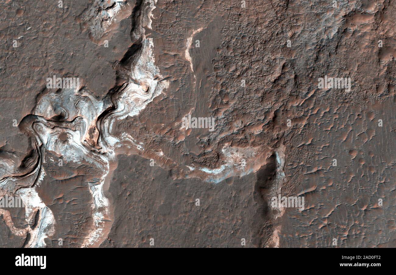 Canyon sediments on Mars. Satellite image of layered deposits (bright ...