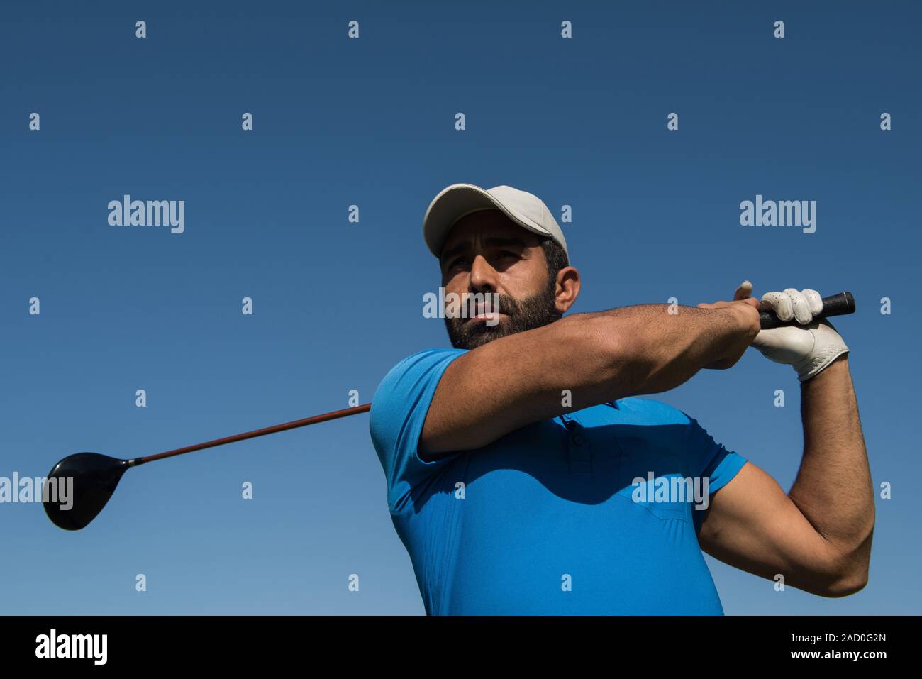 golf player hitting shot Stock Photo - Alamy