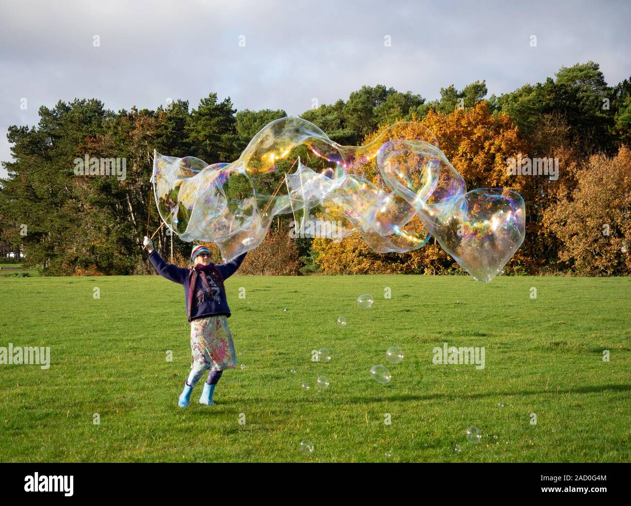Beautiful female blowing bubbles hi-res stock photography and images ...