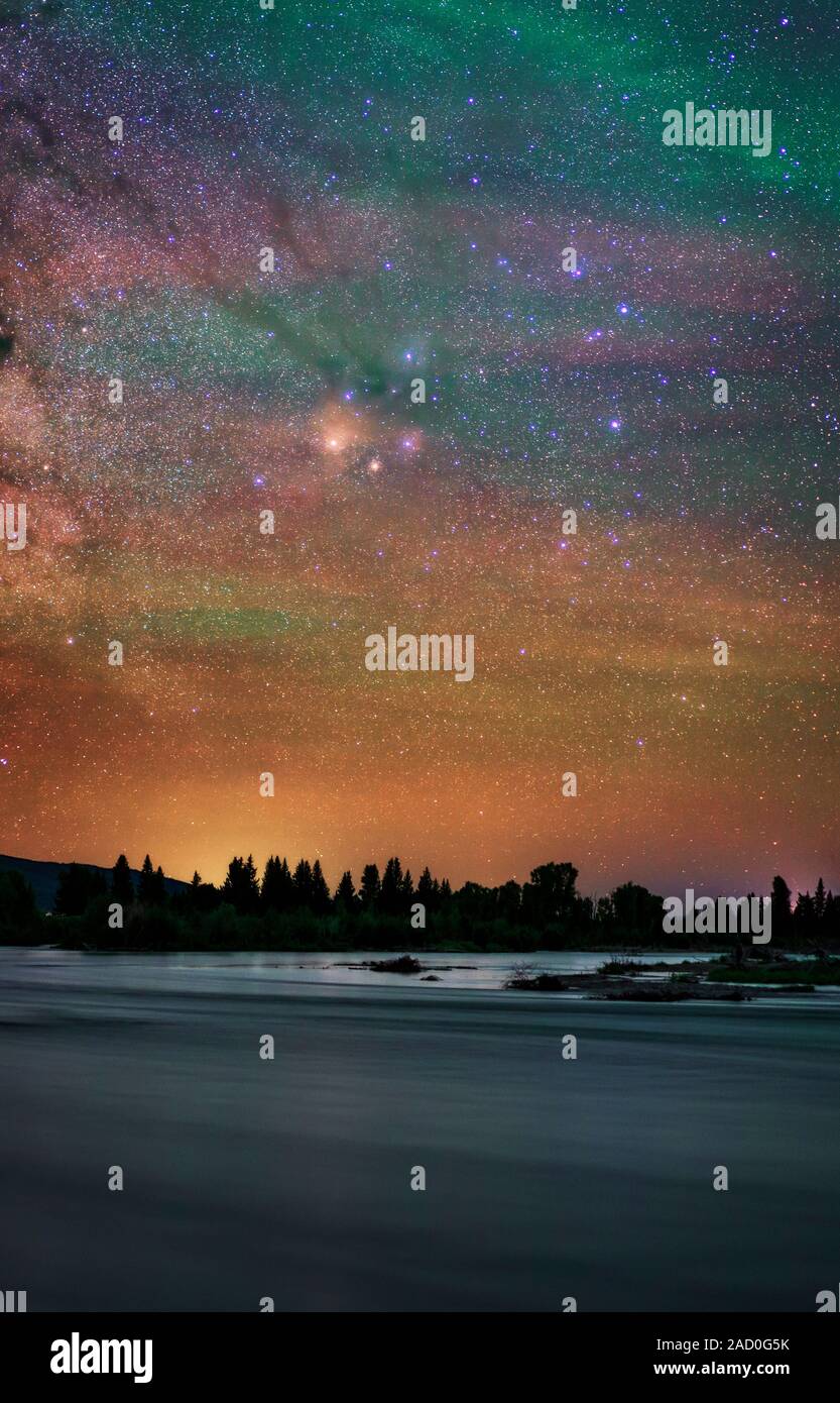 Night sky over Grand Teton National Park. View of stars and airglow ...