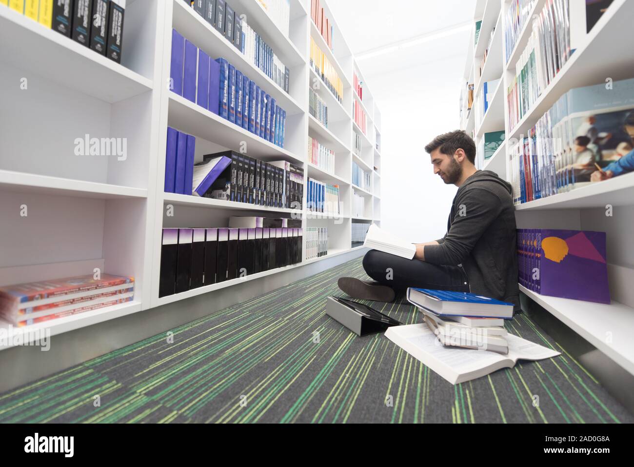 student study in school library Stock Photo - Alamy
