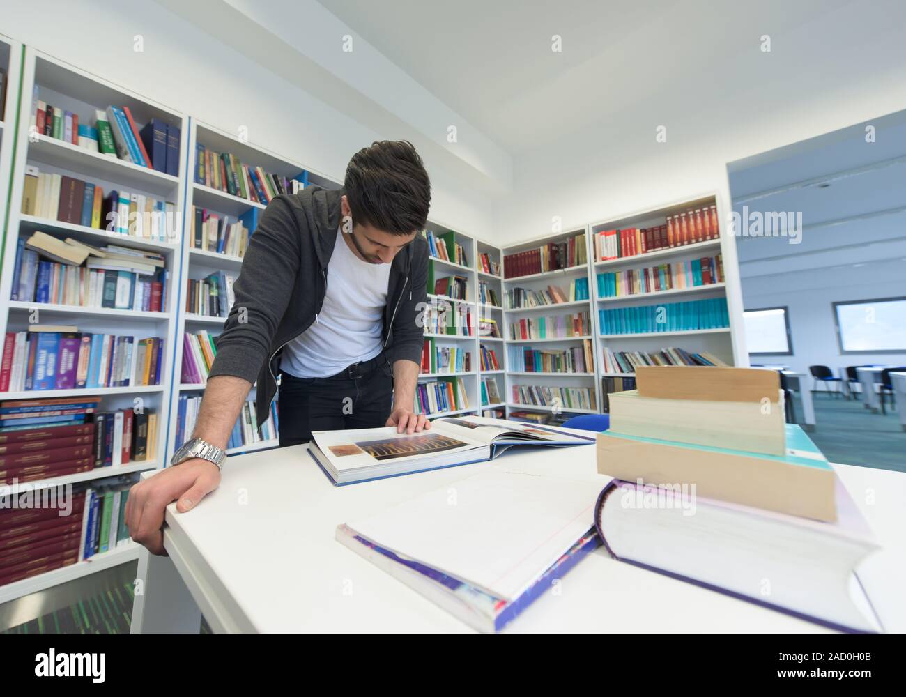 student study in school library Stock Photo - Alamy