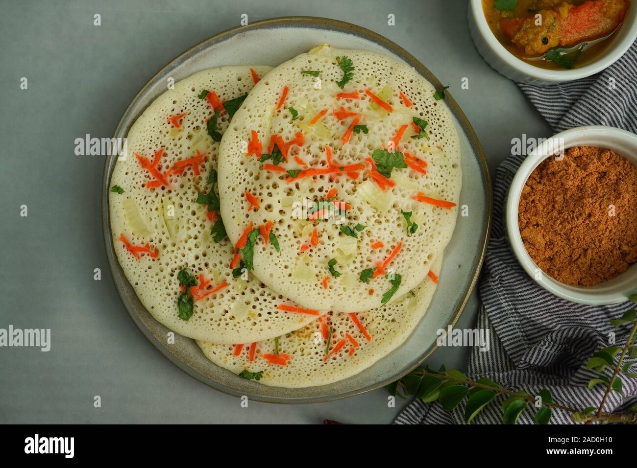 Uthappam/ Oothappam -South Indian breakfast set dosa topped with onion ...