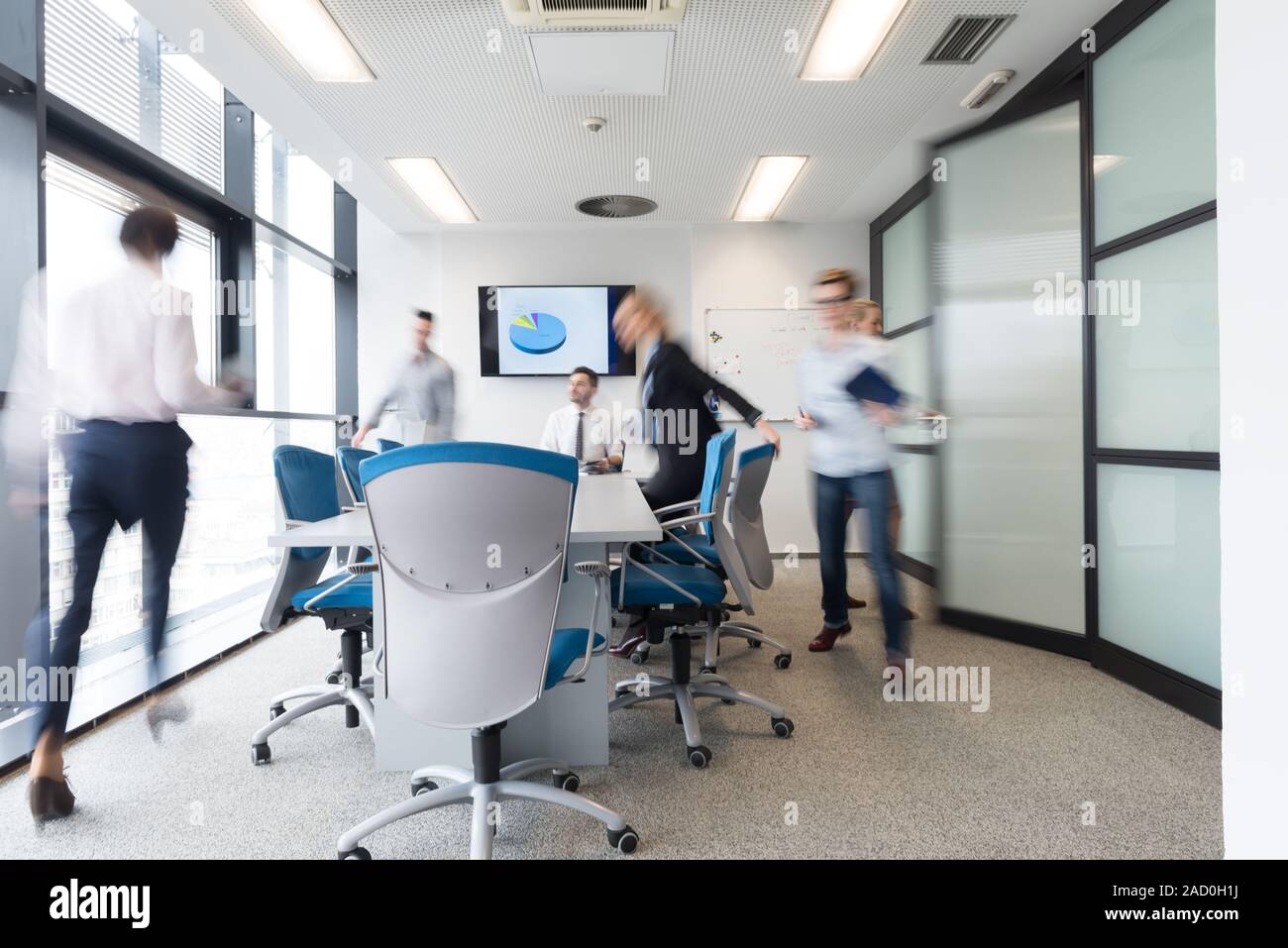 Group business people entering room hi-res stock photography and images ...