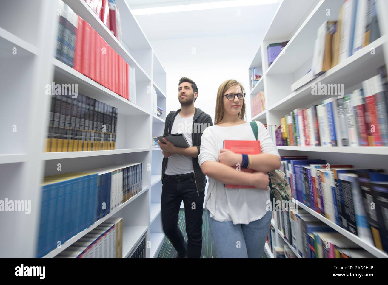 students group in school library Stock Photo - Alamy