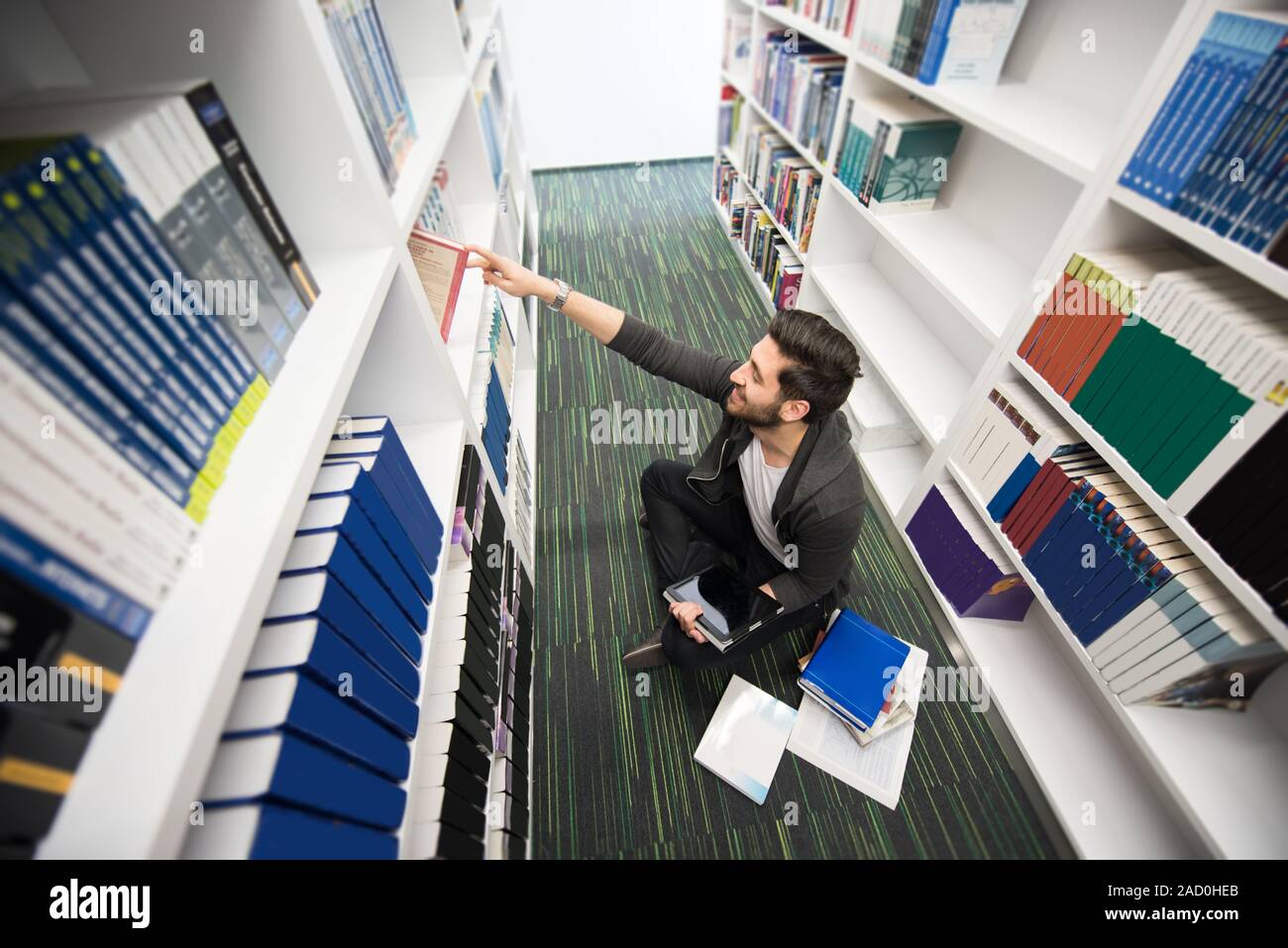student study in school library Stock Photo - Alamy