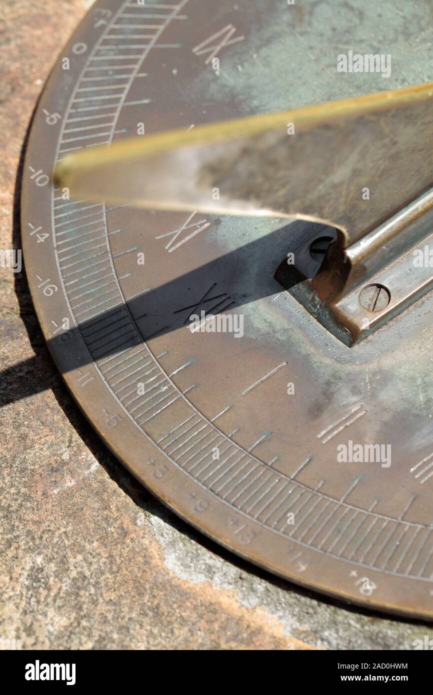 Brass sun dial. Photographed in Kirstenbosch National Botanical Gardens ...