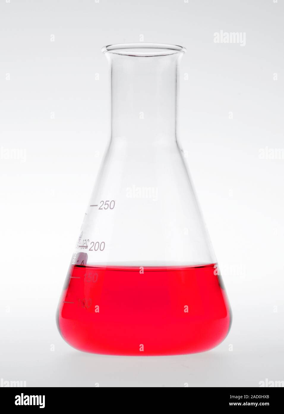 Lab equipment. Conical measuring flask with red liquid Stock Photo - Alamy