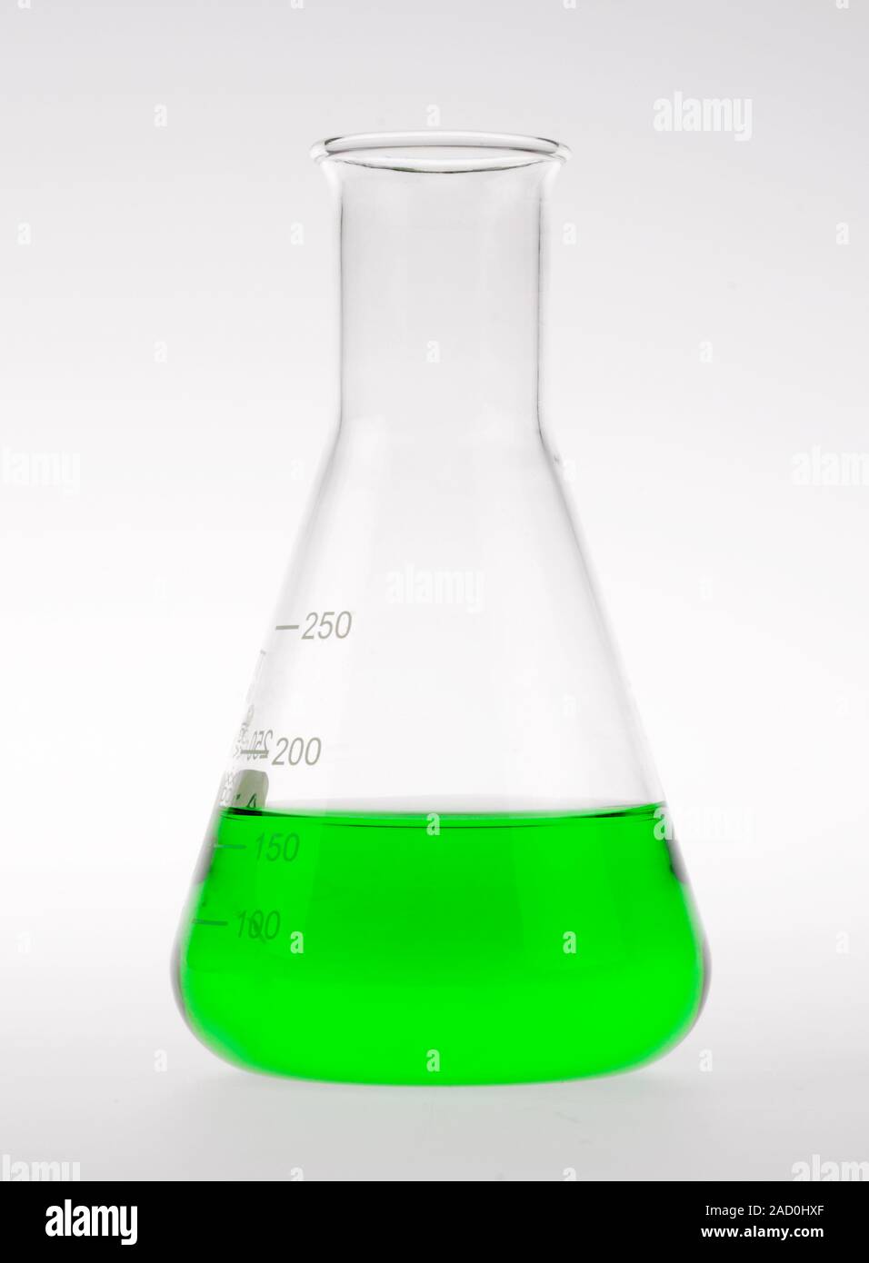 Lab equipment. Conical measuring flask with green liquid Stock Photo ...