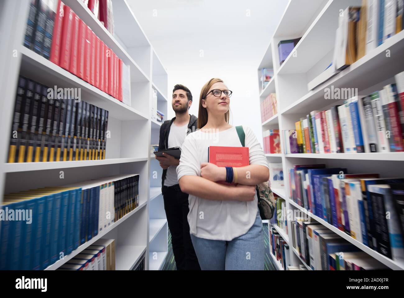 students group in school library Stock Photo - Alamy
