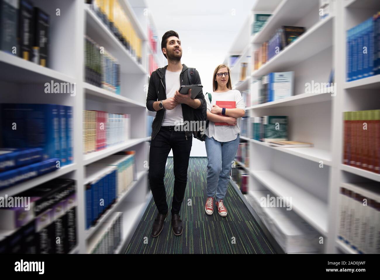 students group in school library Stock Photo - Alamy