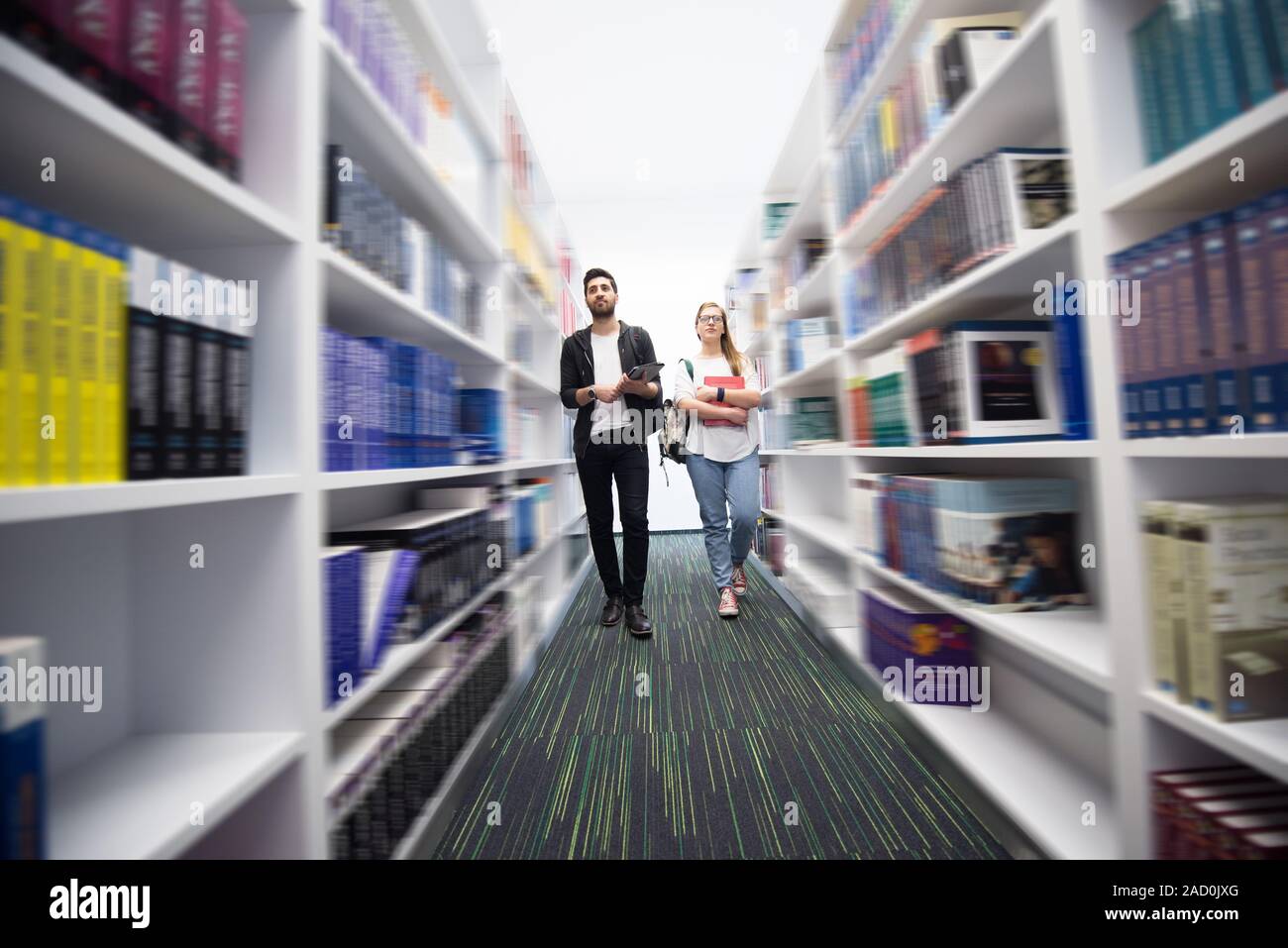 students group in school library Stock Photo - Alamy
