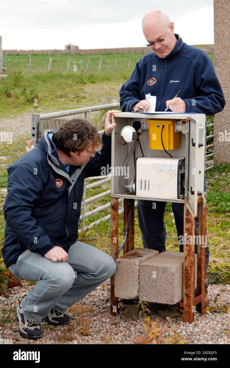 Air quality monitoring. Health Protection Agency workers taking ...