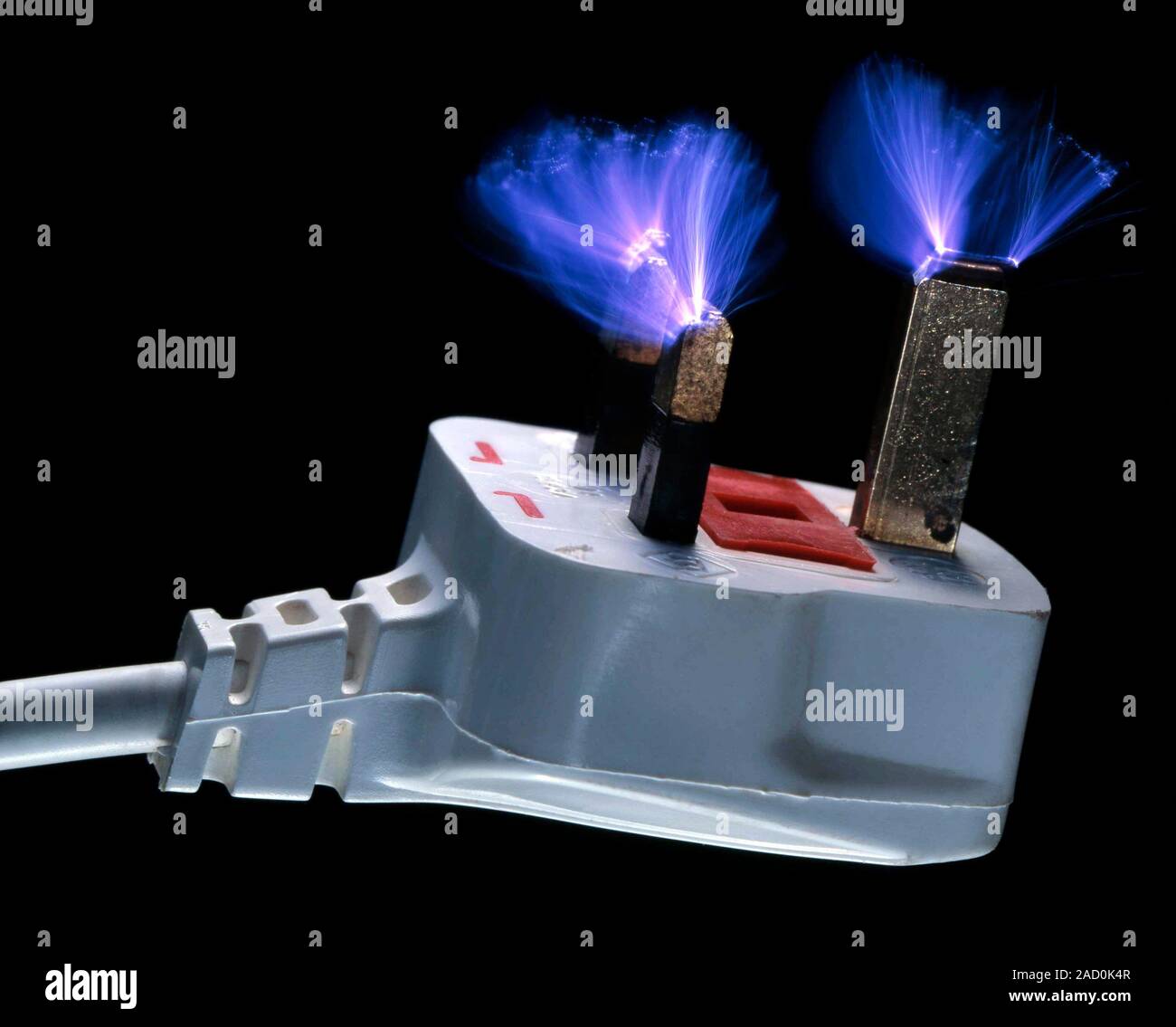Composite image of electrical sparks flying from a plug Stock Photo - Alamy