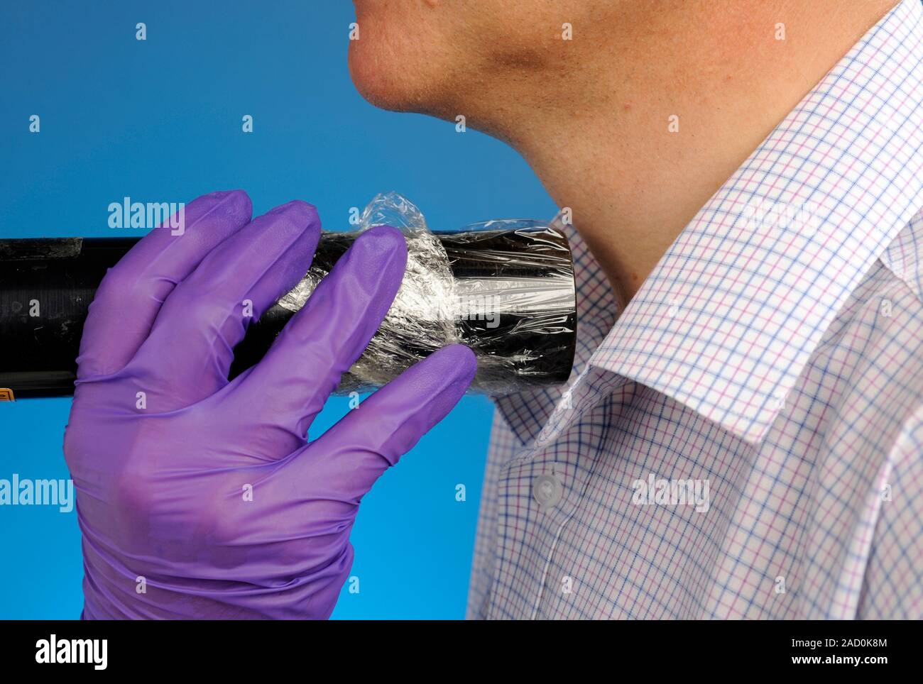 Radiation exposure monitoring. Close-up of the gloved hand of an ...