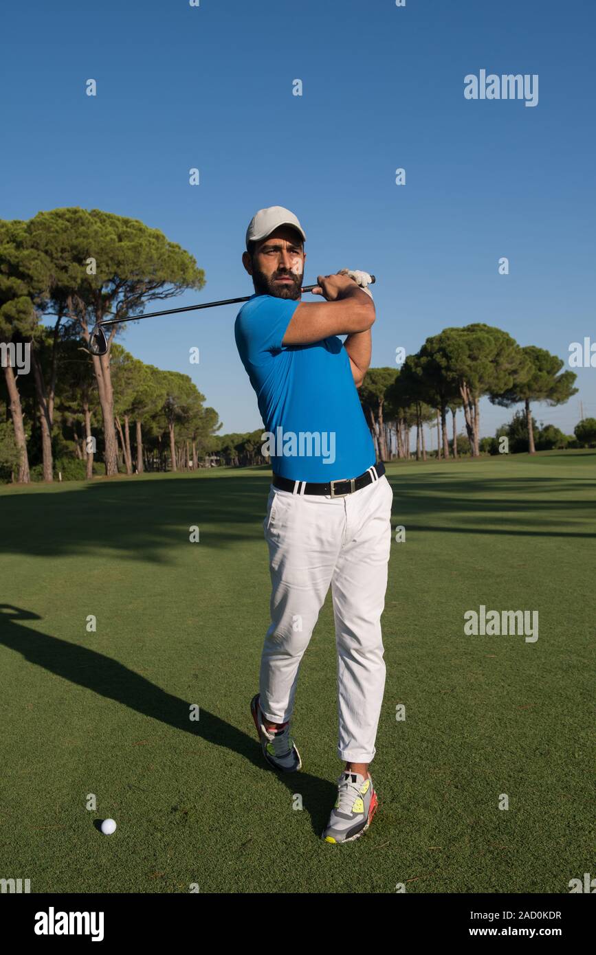 golf player hitting shot Stock Photo - Alamy
