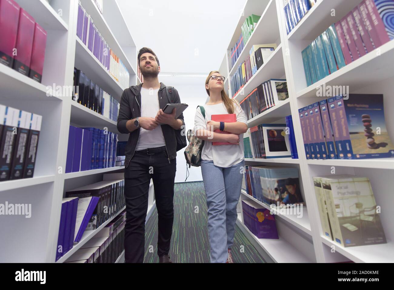 students group in school library Stock Photo - Alamy
