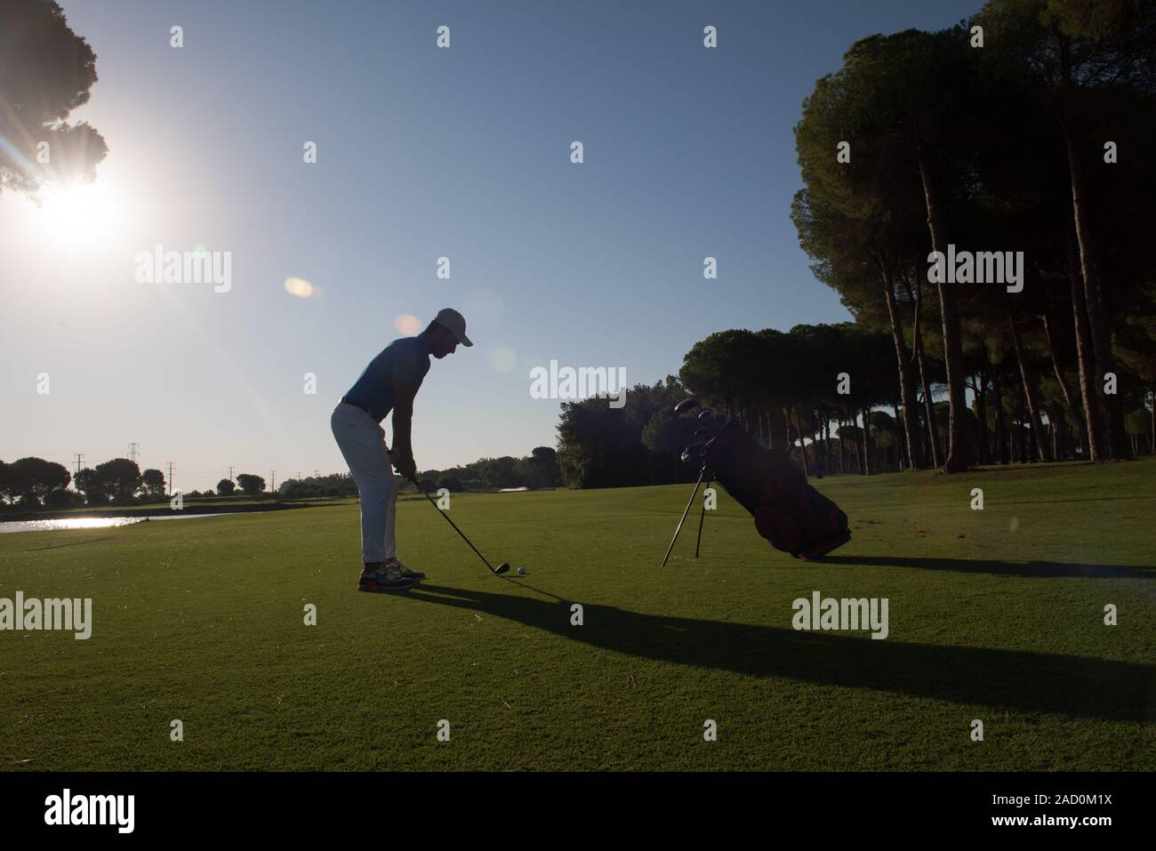 golf player hitting shot Stock Photo - Alamy
