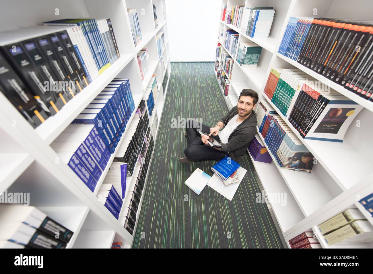 student study in school library Stock Photo - Alamy