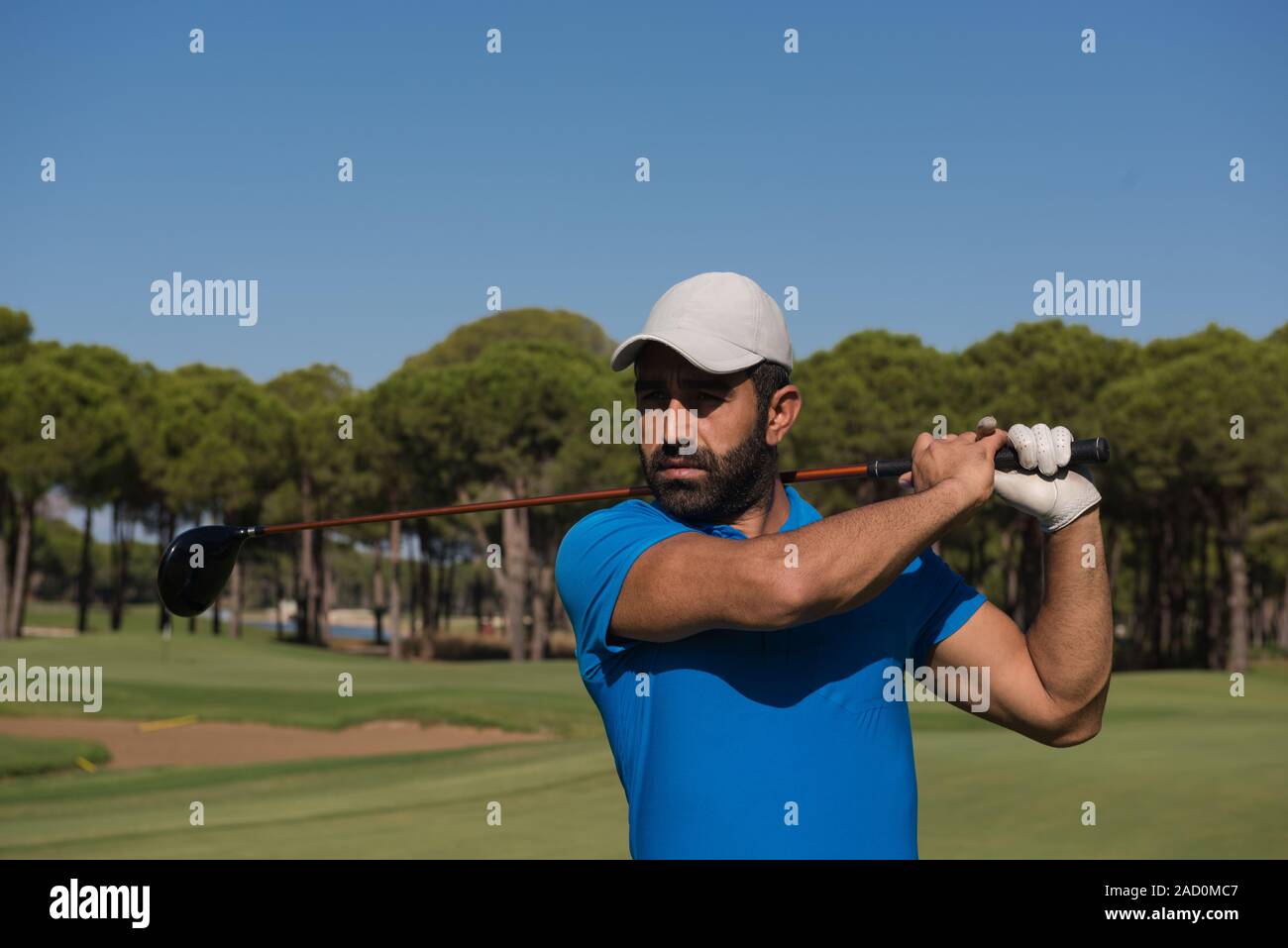 golf player hitting shot Stock Photo - Alamy