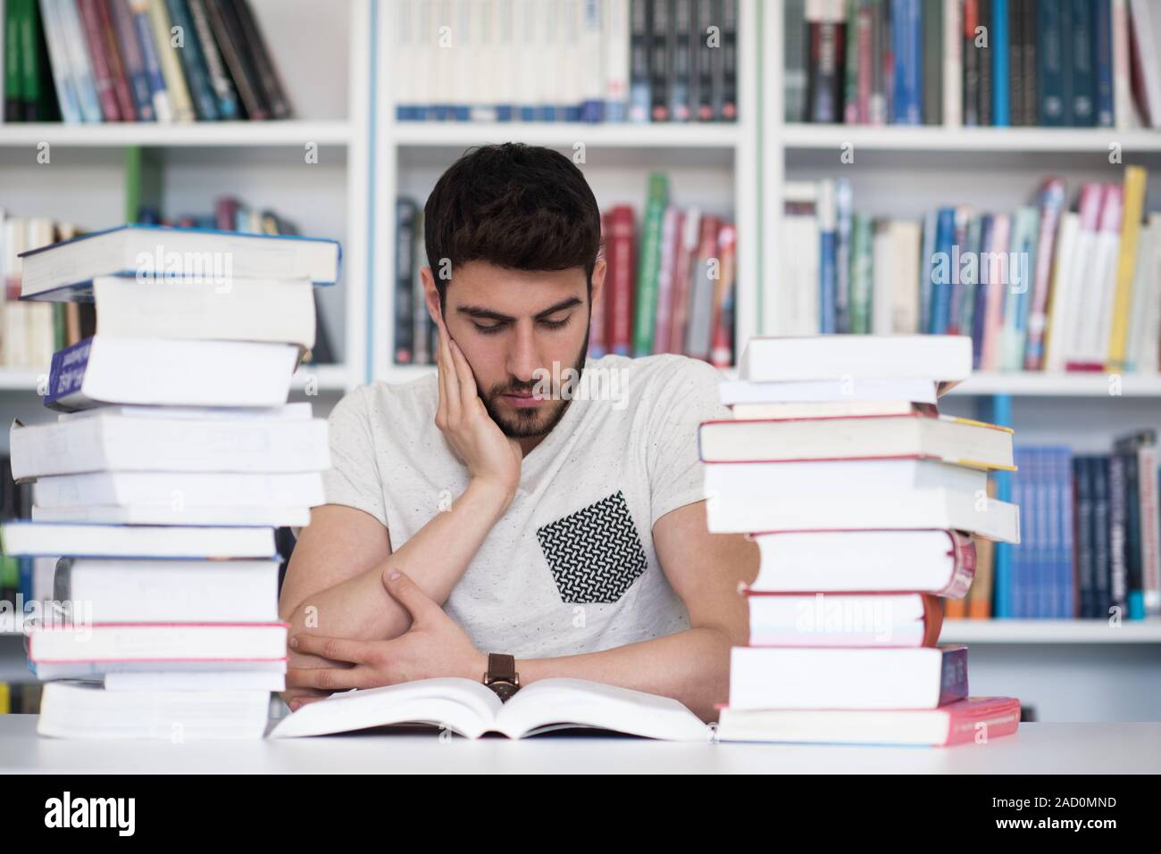 student study in school library Stock Photo - Alamy