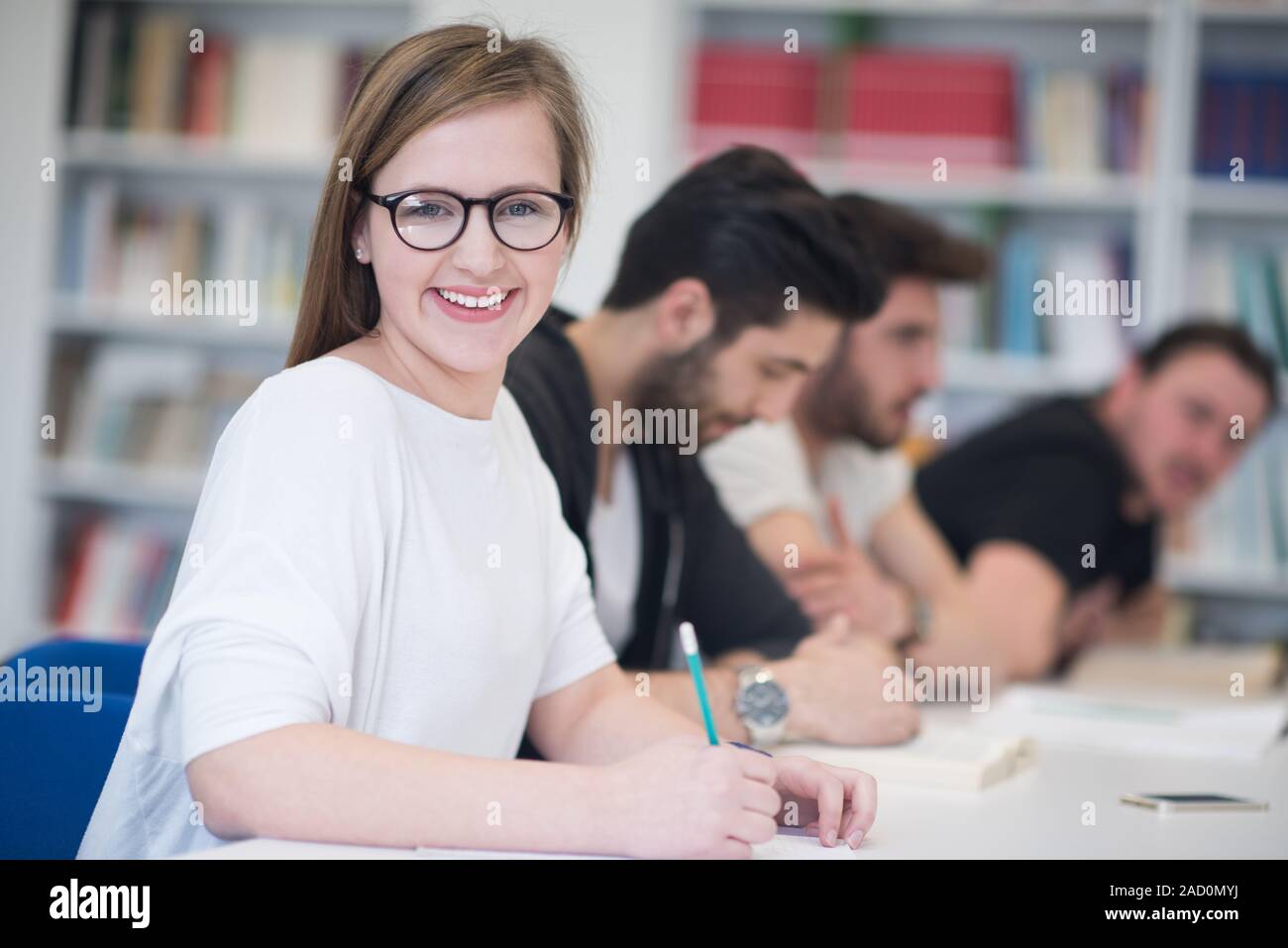 group of students study together in classroom Stock Photo - Alamy