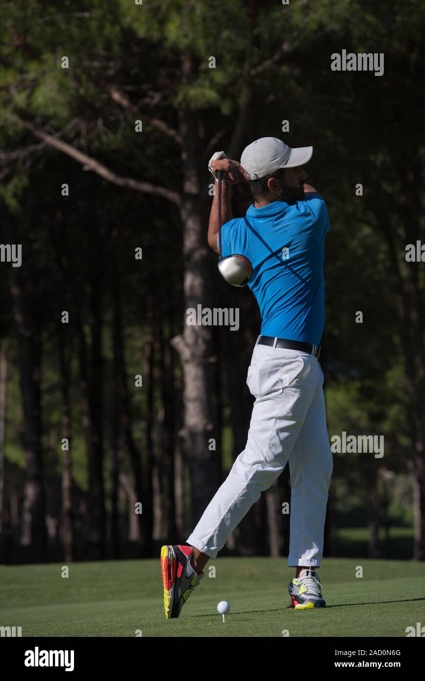 golf player hitting shot Stock Photo - Alamy