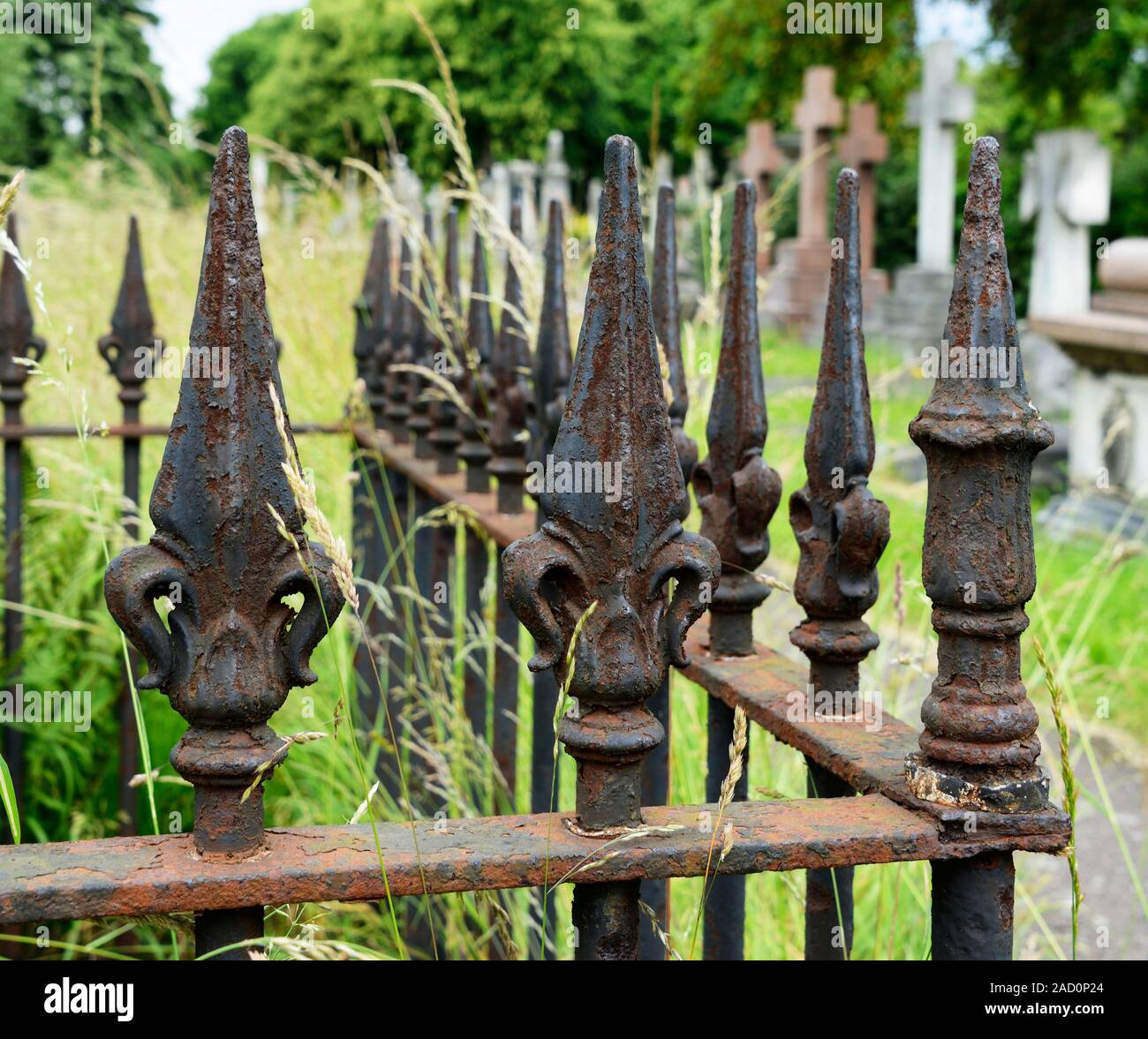 Iron railings. Iron railings in an urban cemetery. Photographed in ...
