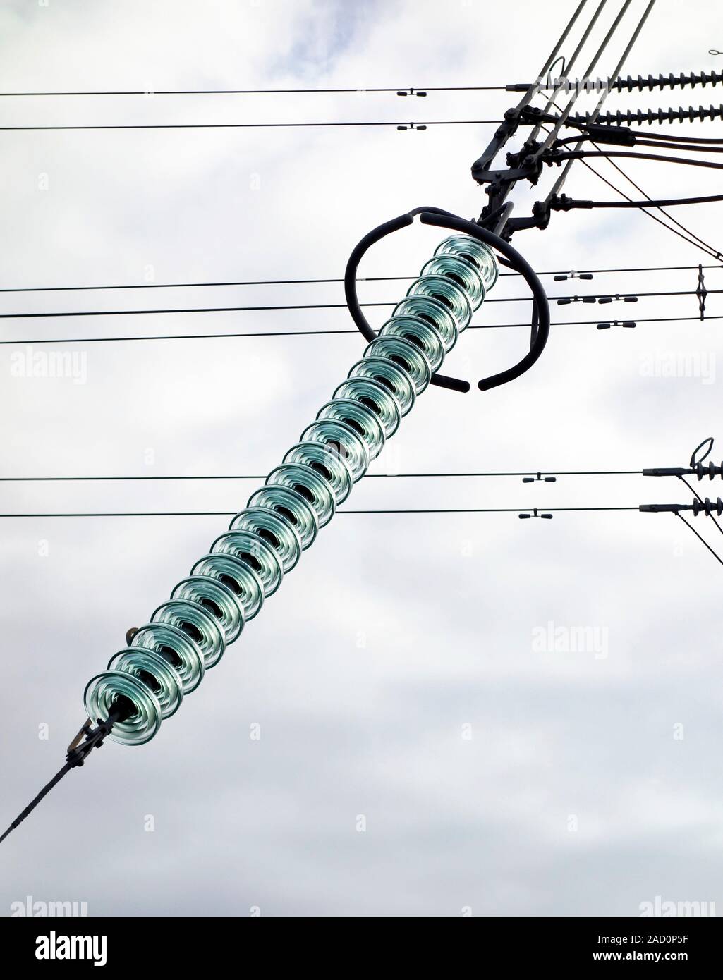 Glass insulators. Suspended glass discs in a cap and pin insulator ...