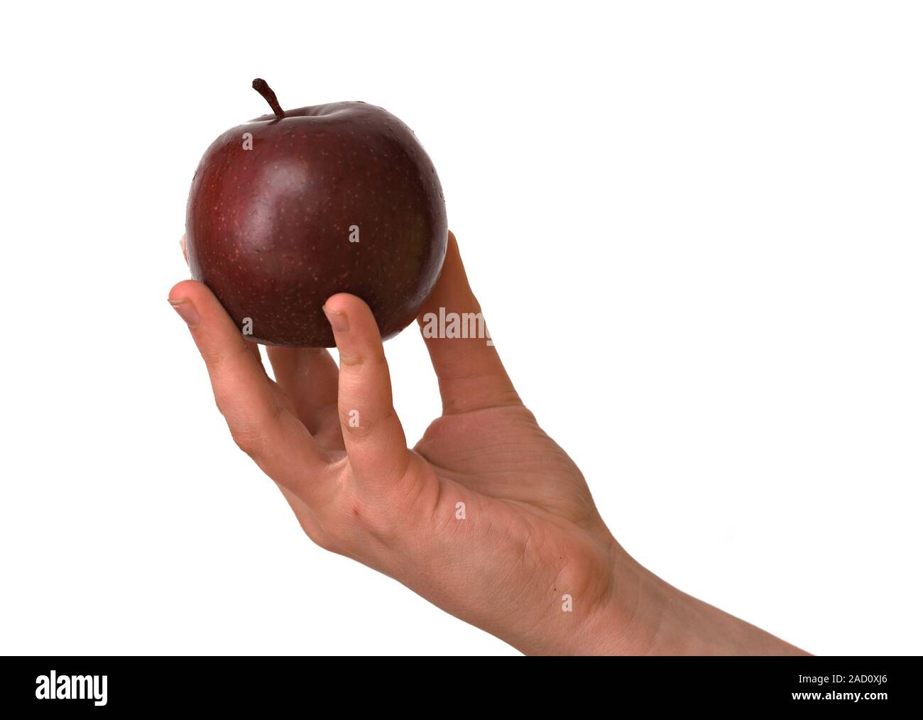 Girl's hand with apple isolated on white background Stock Photo - Alamy