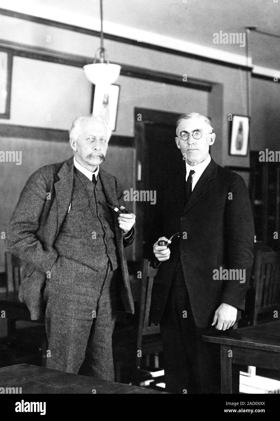 Geneticists Bateson and Emerson, holding smoking pipes. British ...