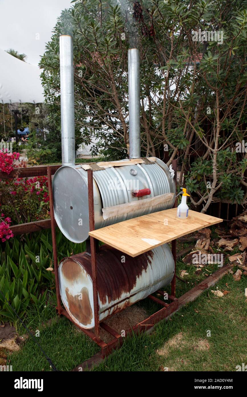Home-made meat smoker. Smoking is the process of exposing food to smoke ...