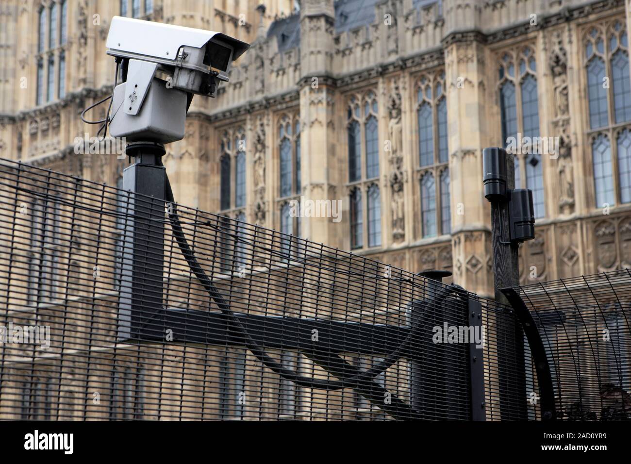 Houses of Parliament security camera. Security camera on a fence at the ...