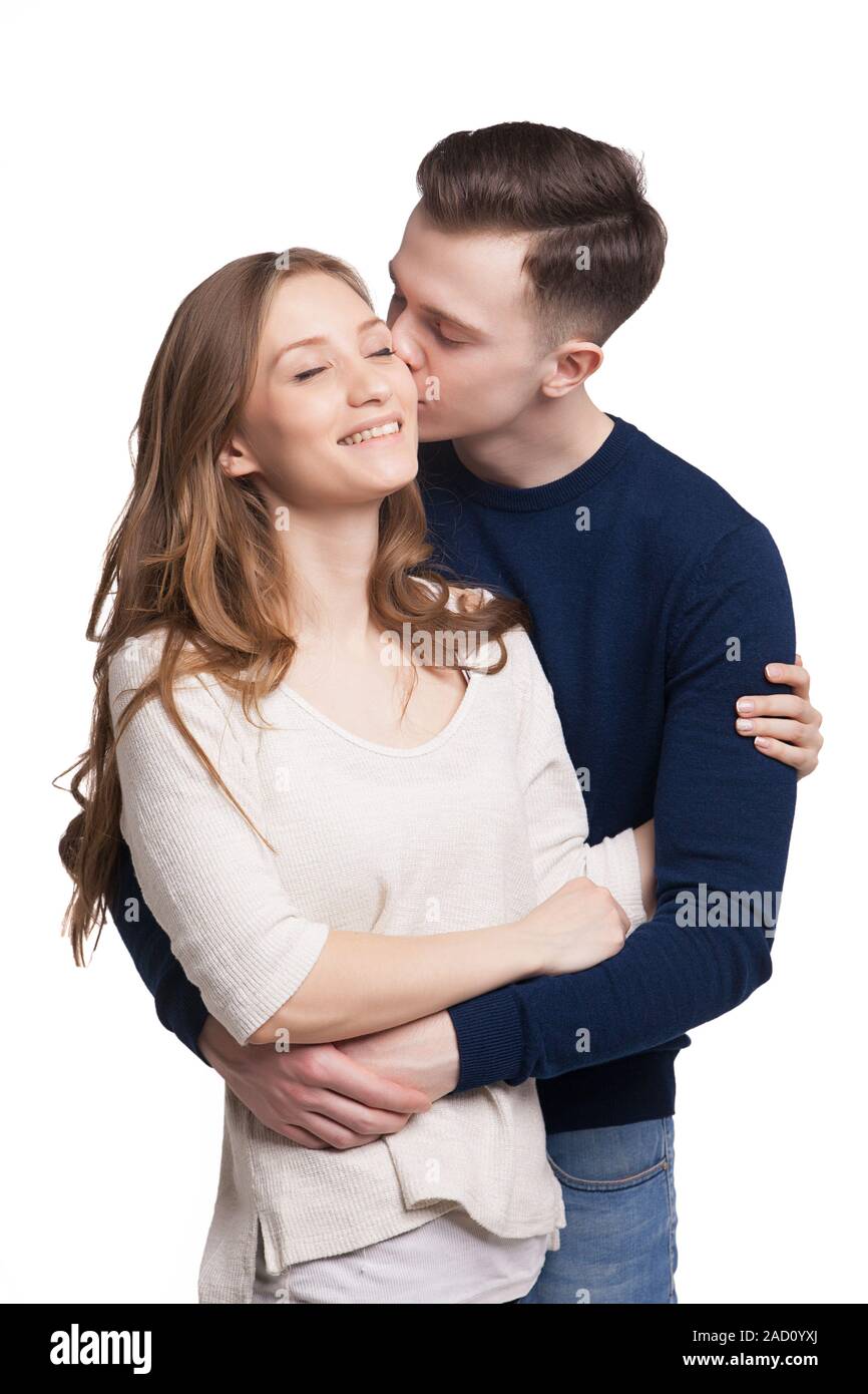 Hugging couple kissing Stock Photo - Alamy