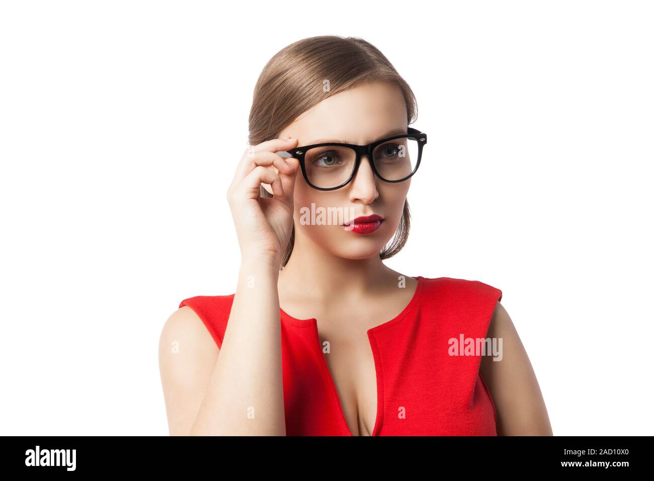 Beautiful lady in glasses thinking while looking up Stock Photo - Alamy